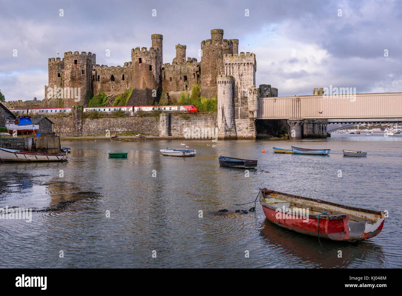 Conwy castle. Virgin Voyager train Stock Photo - Alamy