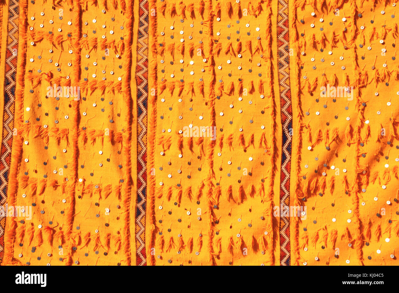 Texture of berber traditional carpet of yellow color with geometric ...