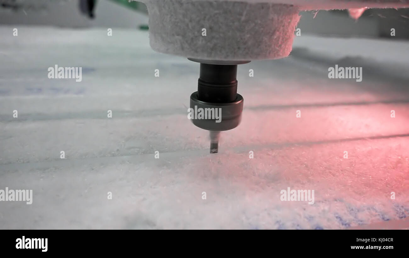 Milling cutter cuts plastic part on robotized line Stock Photo - Alamy