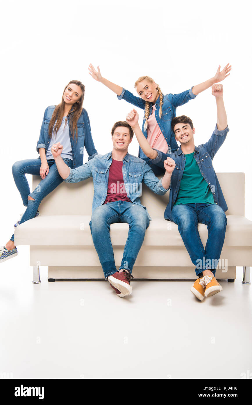 Beautiful girls sitting on couch hi-res stock photography and images ...