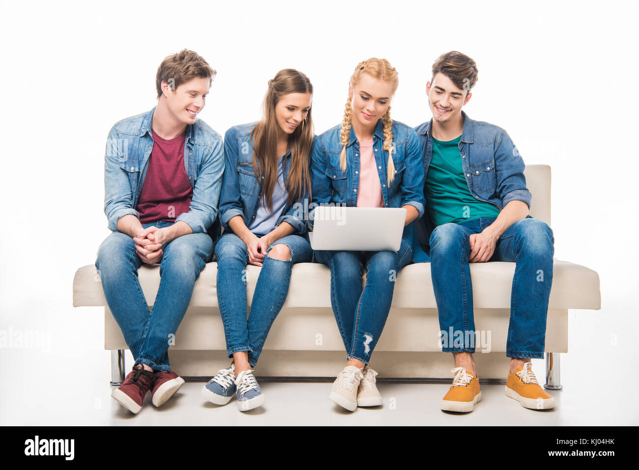 friends using laptop Stock Photo - Alamy