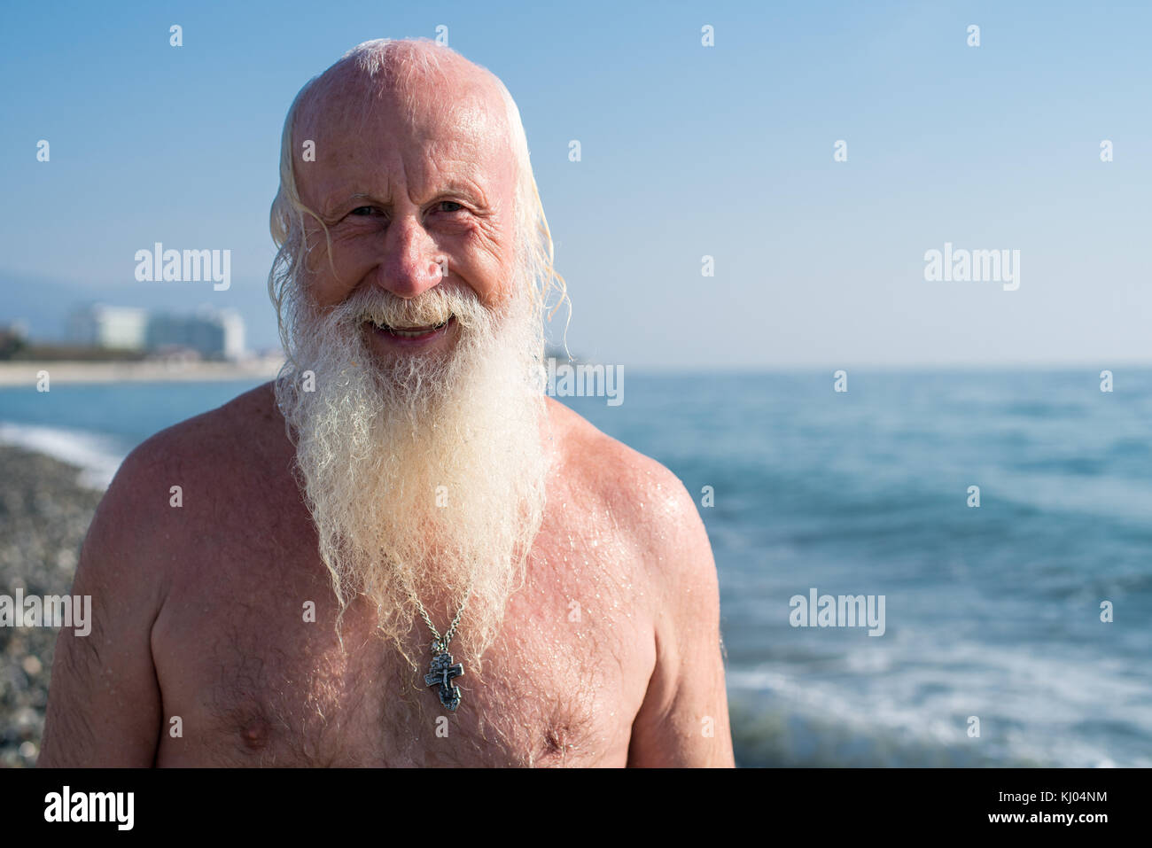 Handsome old man swimming in the sea Stock Photo - Alamy