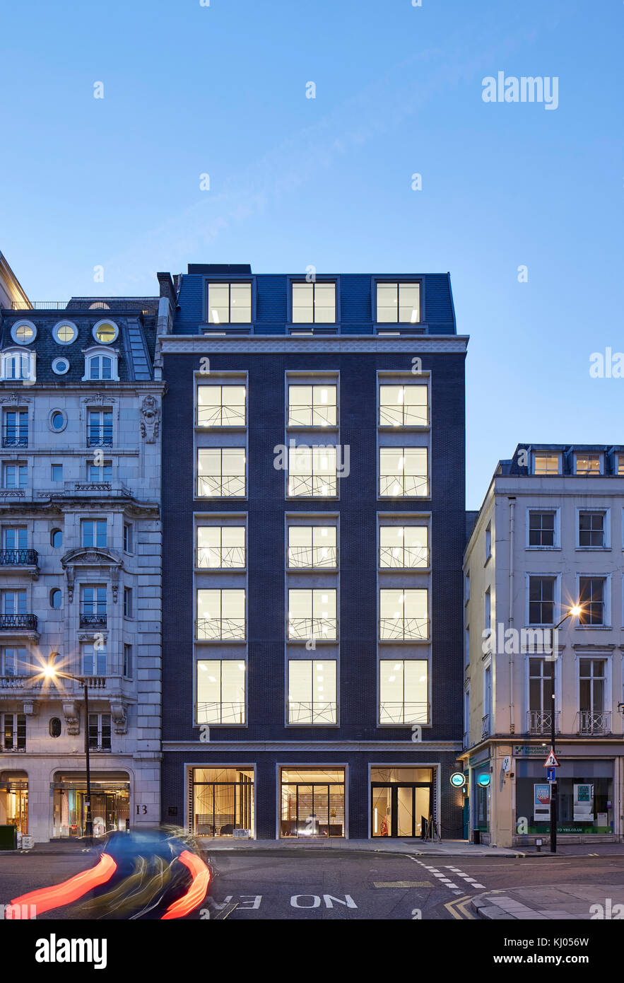 Front elevation with street at dusk. 11 Hanover Square, London, United ...