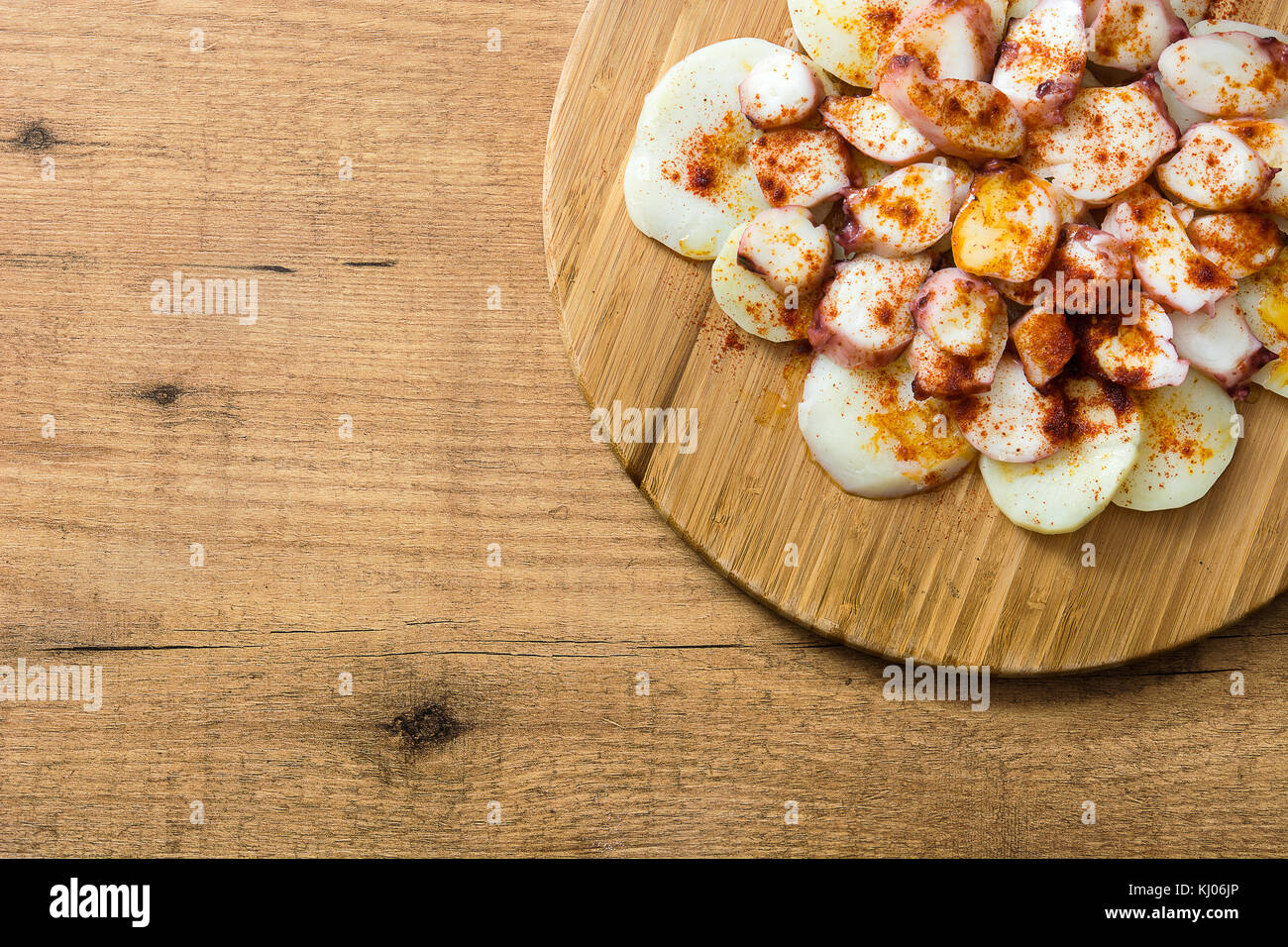 Pulpo a la gallega. Galician octopus on wood. Typical spanish food ...