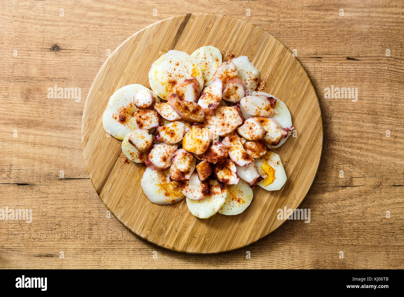 Pulpo a la gallega. Galician octopus on wood. Typical spanish food ...
