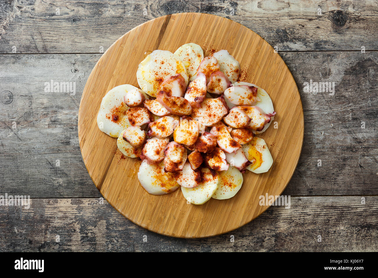 Pulpo a la gallega. Galician octopus on wood. Typical spanish food ...