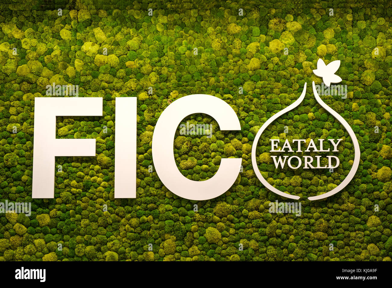 The logo of Fico Eataly World with green moss musk on background ...
