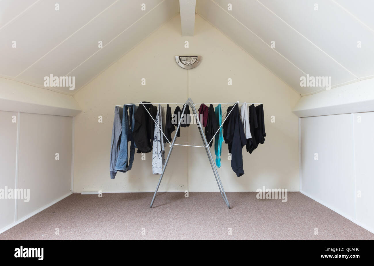 Empty attic room interior - Simple small dutch attic Stock Photo - Alamy