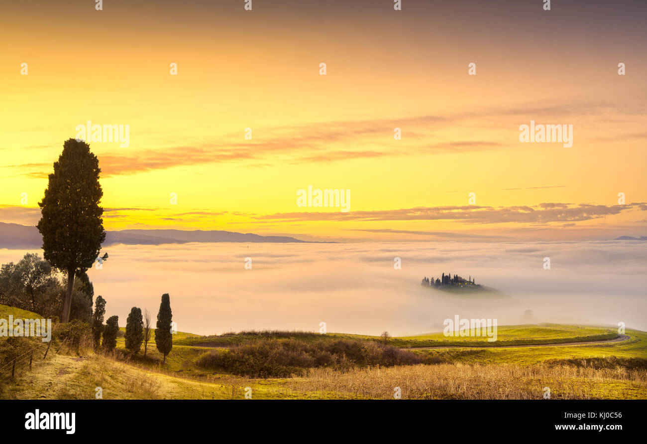 Volterra fog and sea of clouds, rolling hills panorama on sunset ...