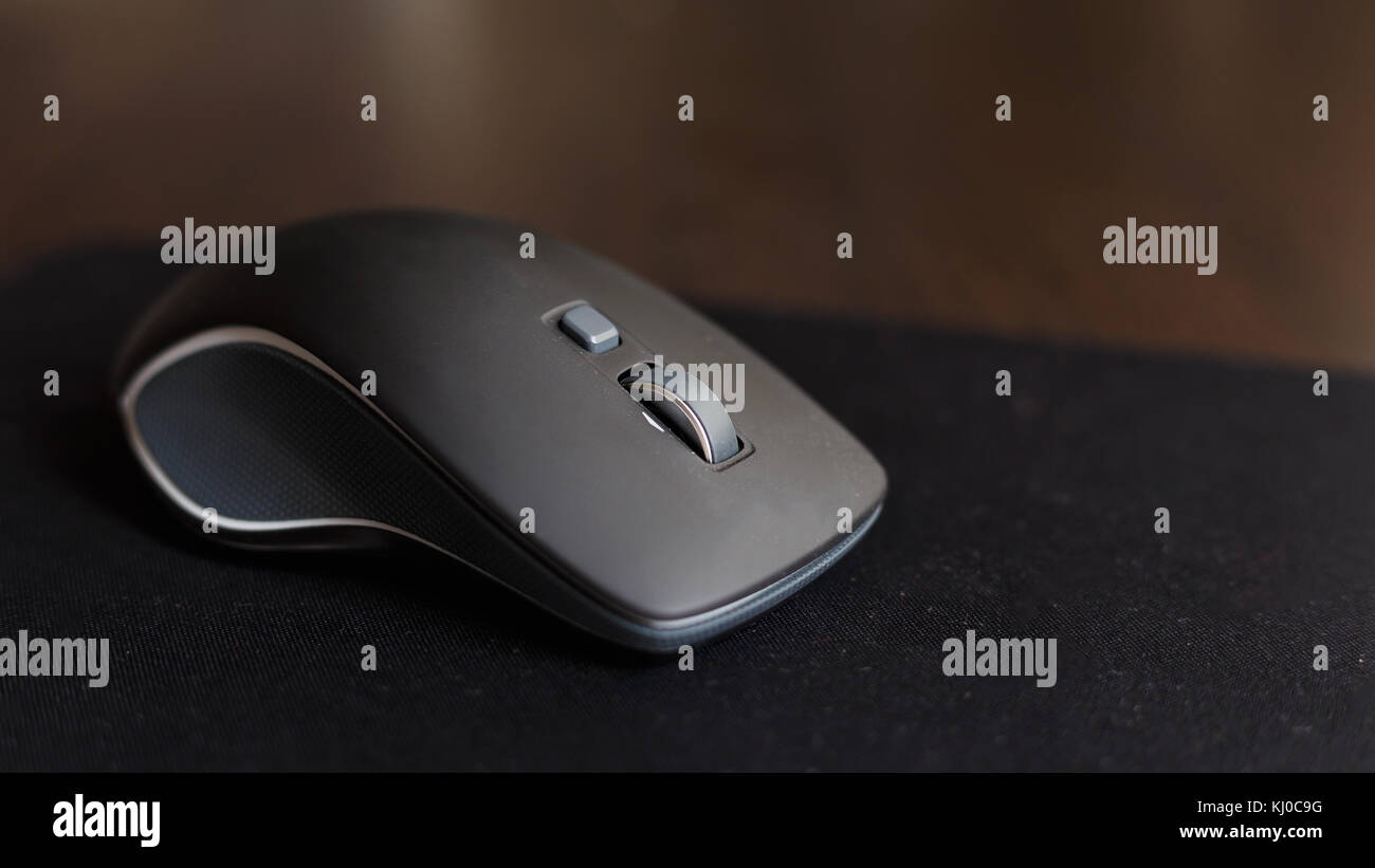 wireless computer mouse on the desktop Stock Photo - Alamy
