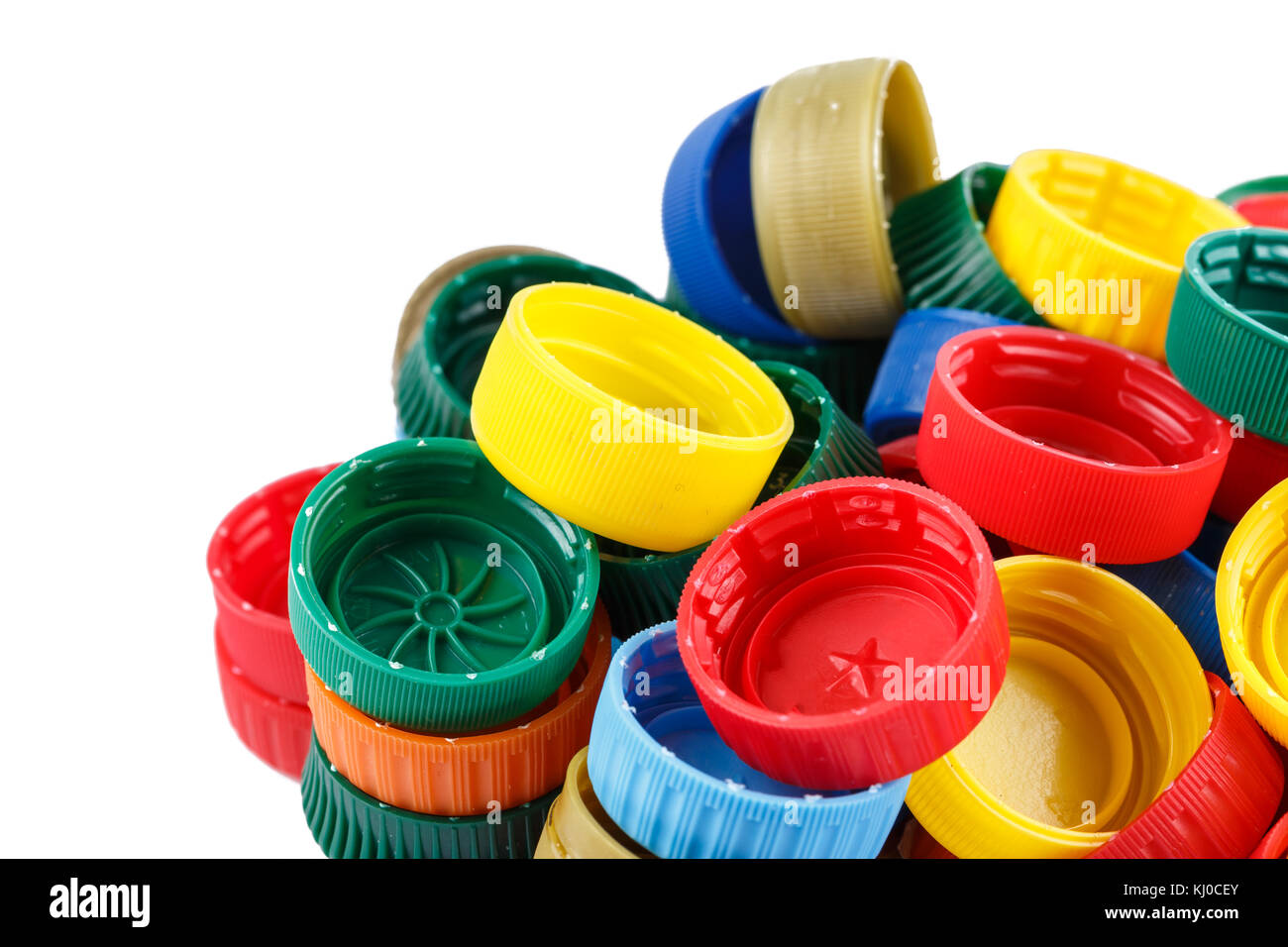 group of multicolored bottle caps, isolated background Stock Photo - Alamy