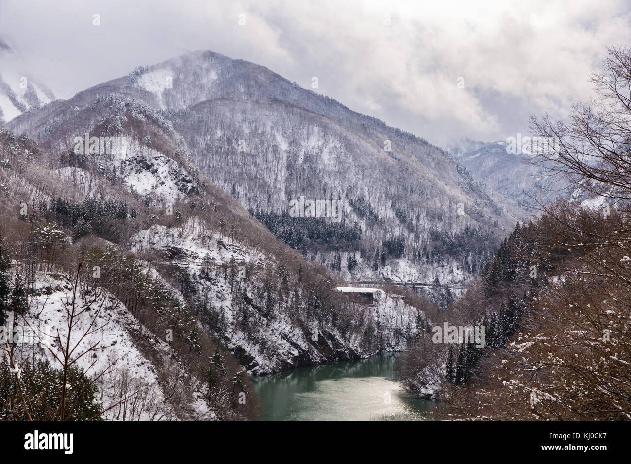 Train in Winter landscape snow on bridge Stock Photo - Alamy
