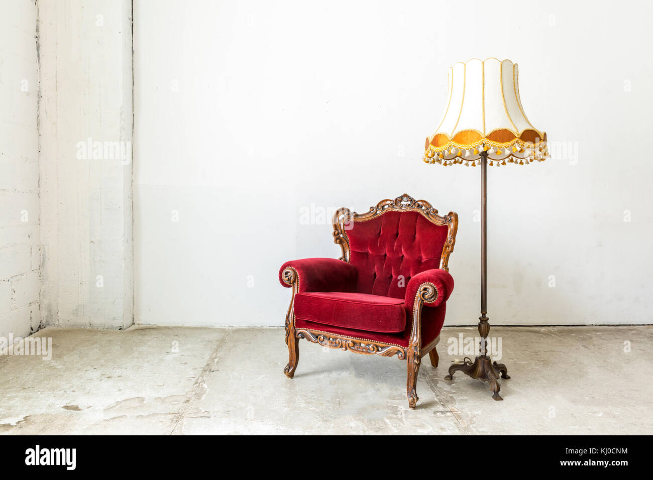 Red Vintage retro style Chair with lamp Stock Photo - Alamy