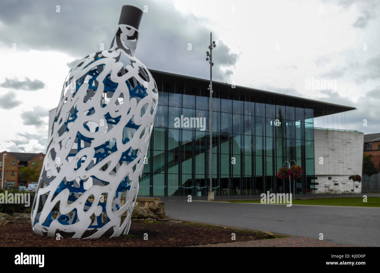 Bottle of Notes statue with MIMA building in the background in ...