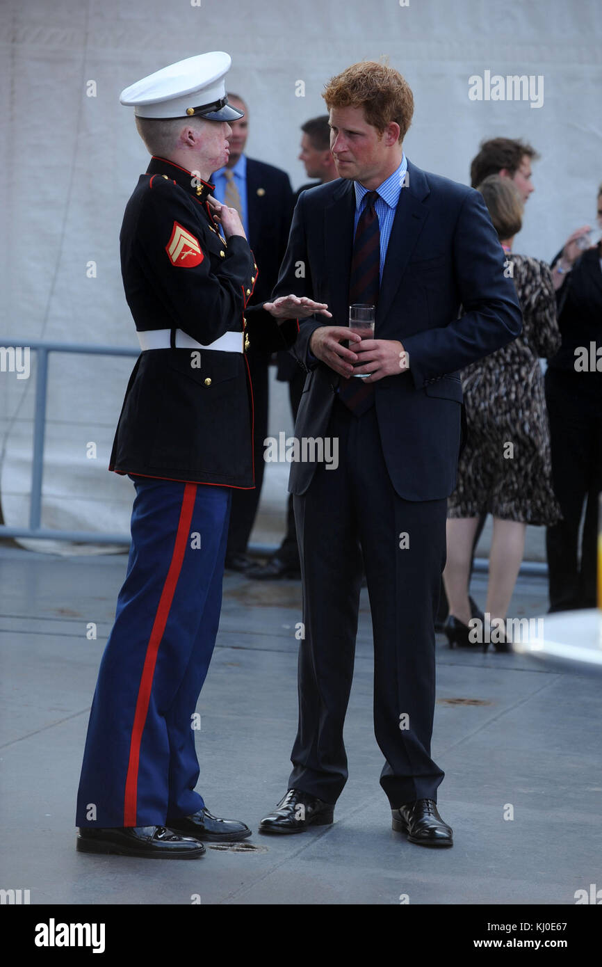 NEW YORK - JUNE 25: Prince Harry (R) speaks with U.S. Marine veteran ...