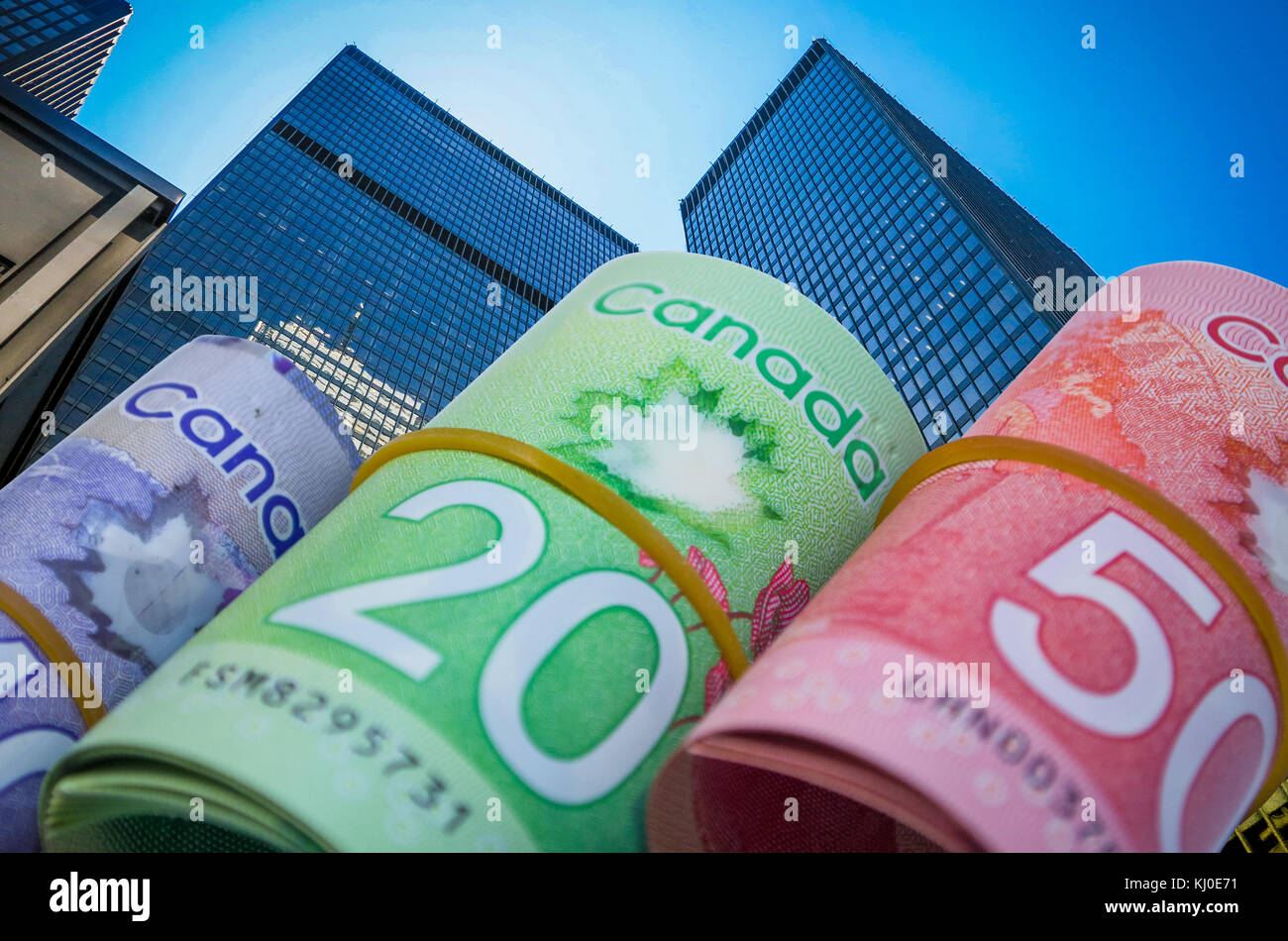 Canadian Dollars & Skyscraper Exterior Background Stock Photo - Alamy