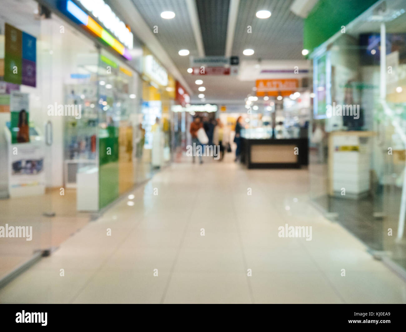 Shopping mall blur background with bokeh. Blurred hall of shopping mall ...