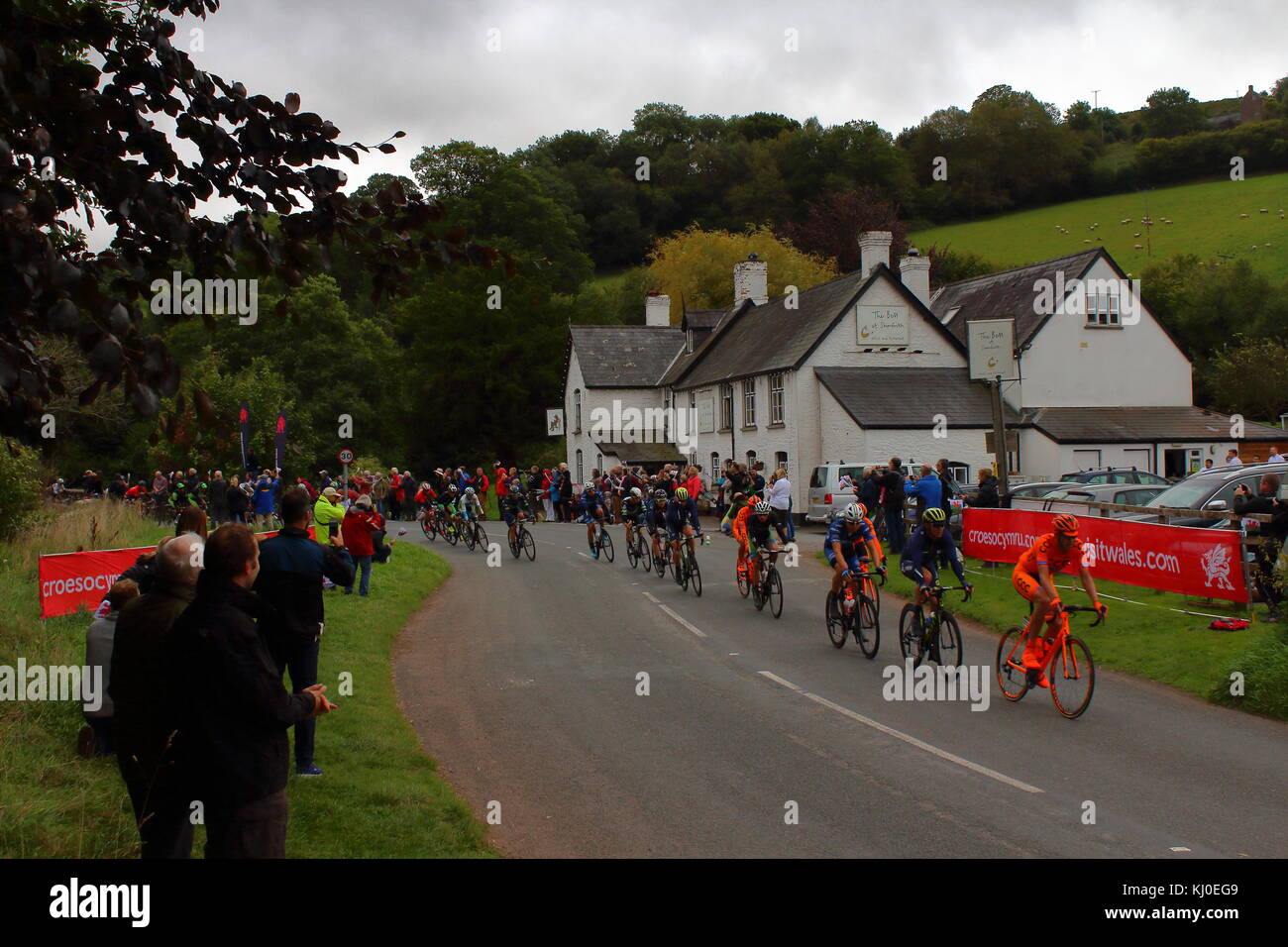 Cyclists in the Tour of Britain 2017 passing The Bell Inn, Skenfrith ...