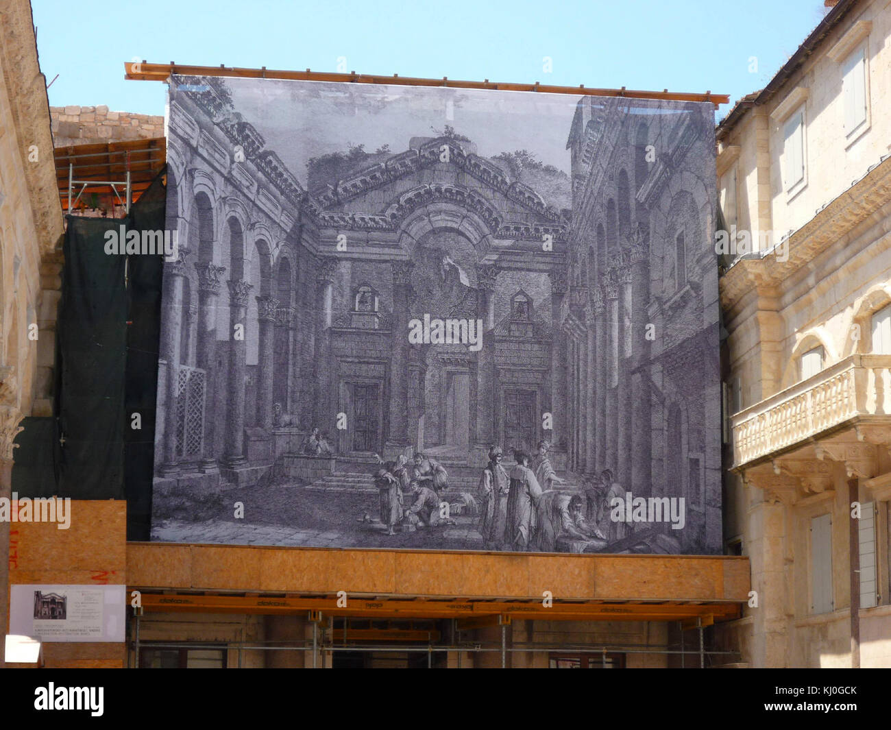 Large linen painting on the facade of the building Stock Photo - Alamy