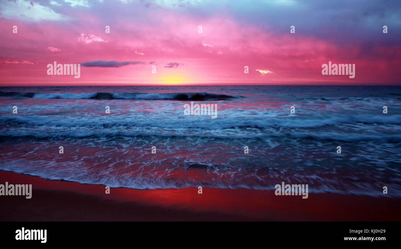 Sunlight scattered through storm clouds at sunset Stock Photo - Alamy