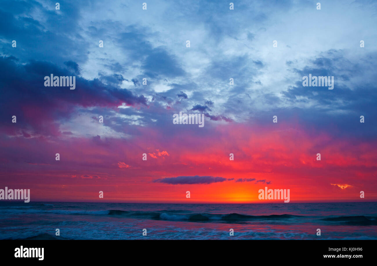 Brilliant light scattered through clouds at sunset Stock Photo - Alamy