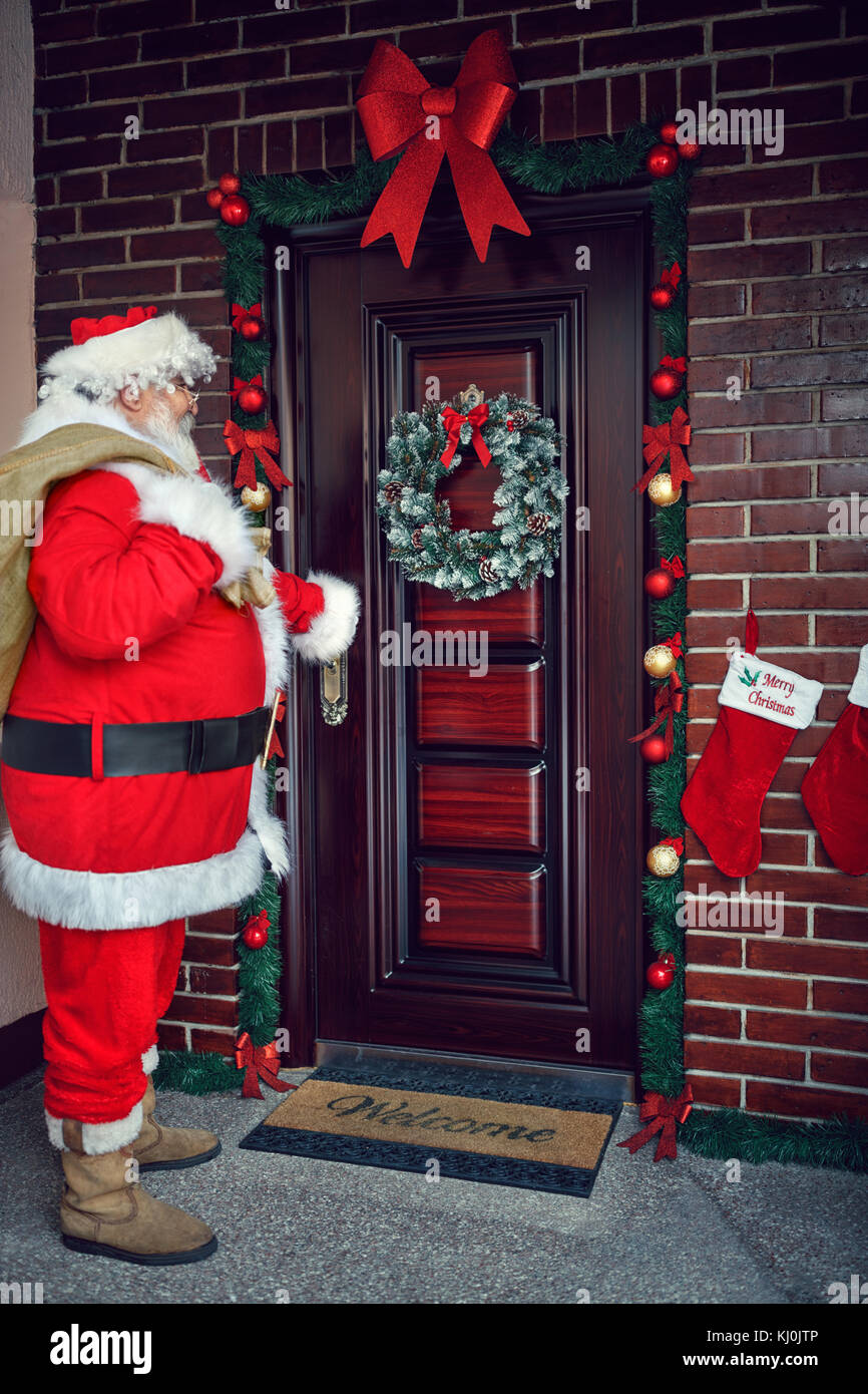 Happy Santa Claus bring the Christmas present for children Stock Photo ...