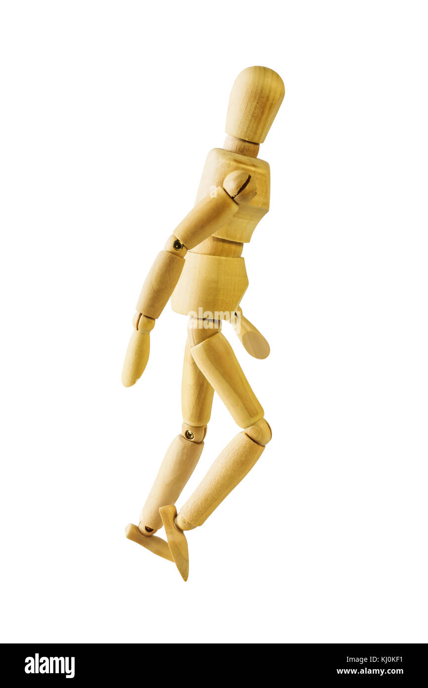 Wooden puppet walk action in white isolated with clipping path Stock ...