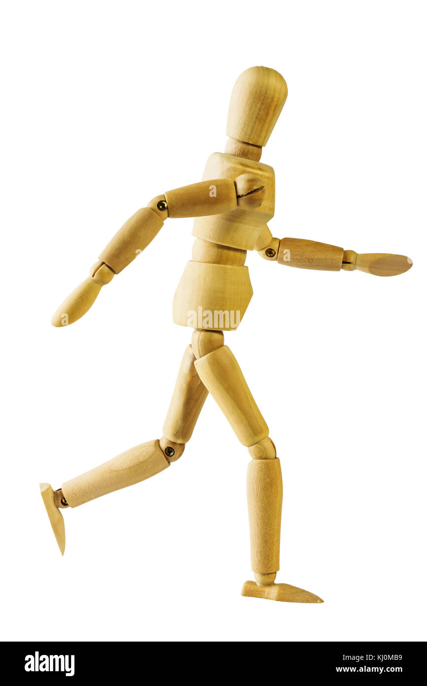 Wooden puppet walk action in white isolated with clipping path Stock ...