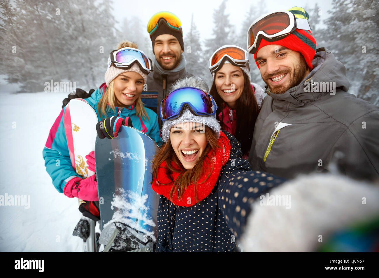 winter, extreme sport and people concept - happy friends having fun on ...