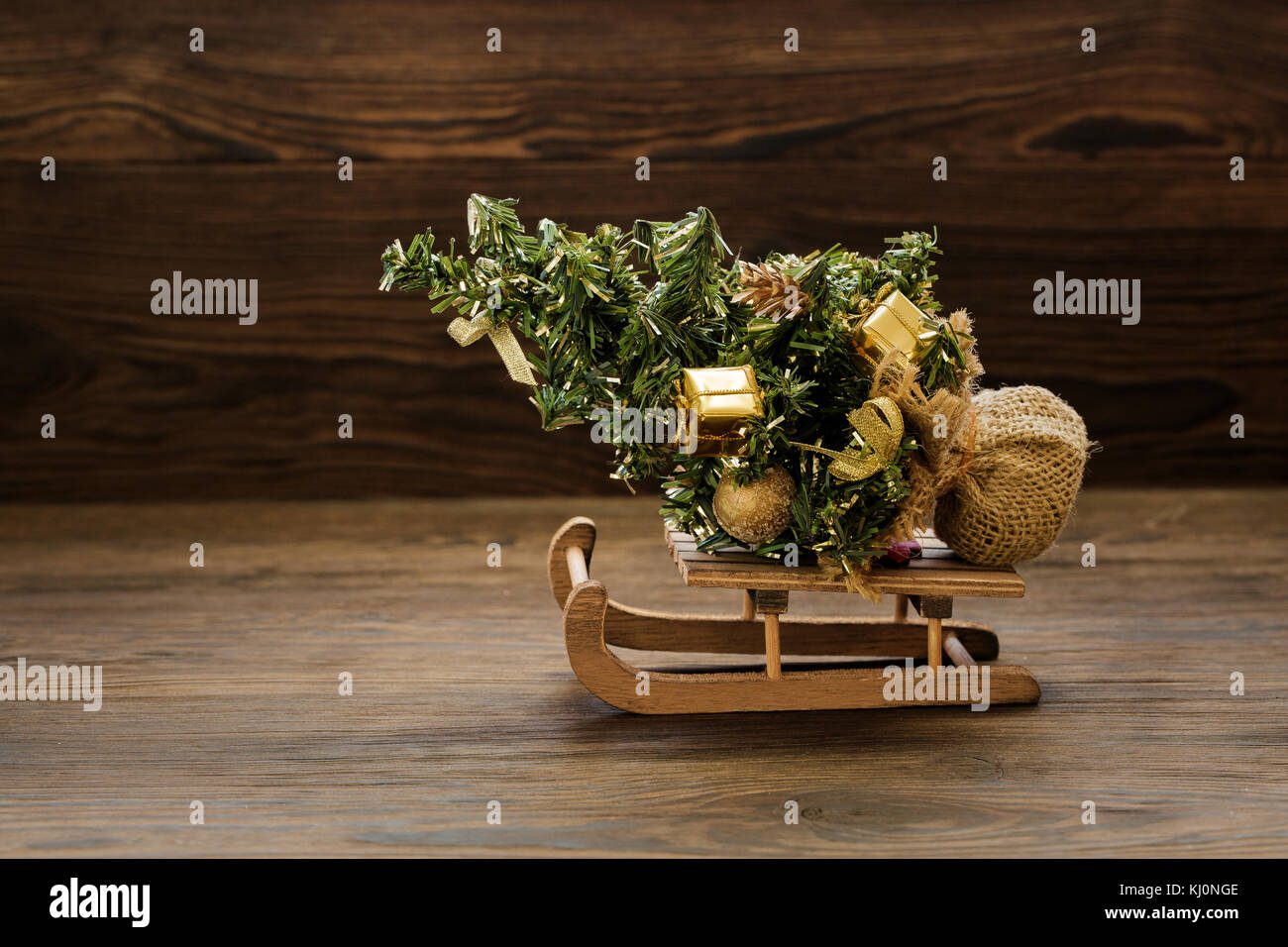 fir-tree on sled on Christmas background Stock Photo - Alamy