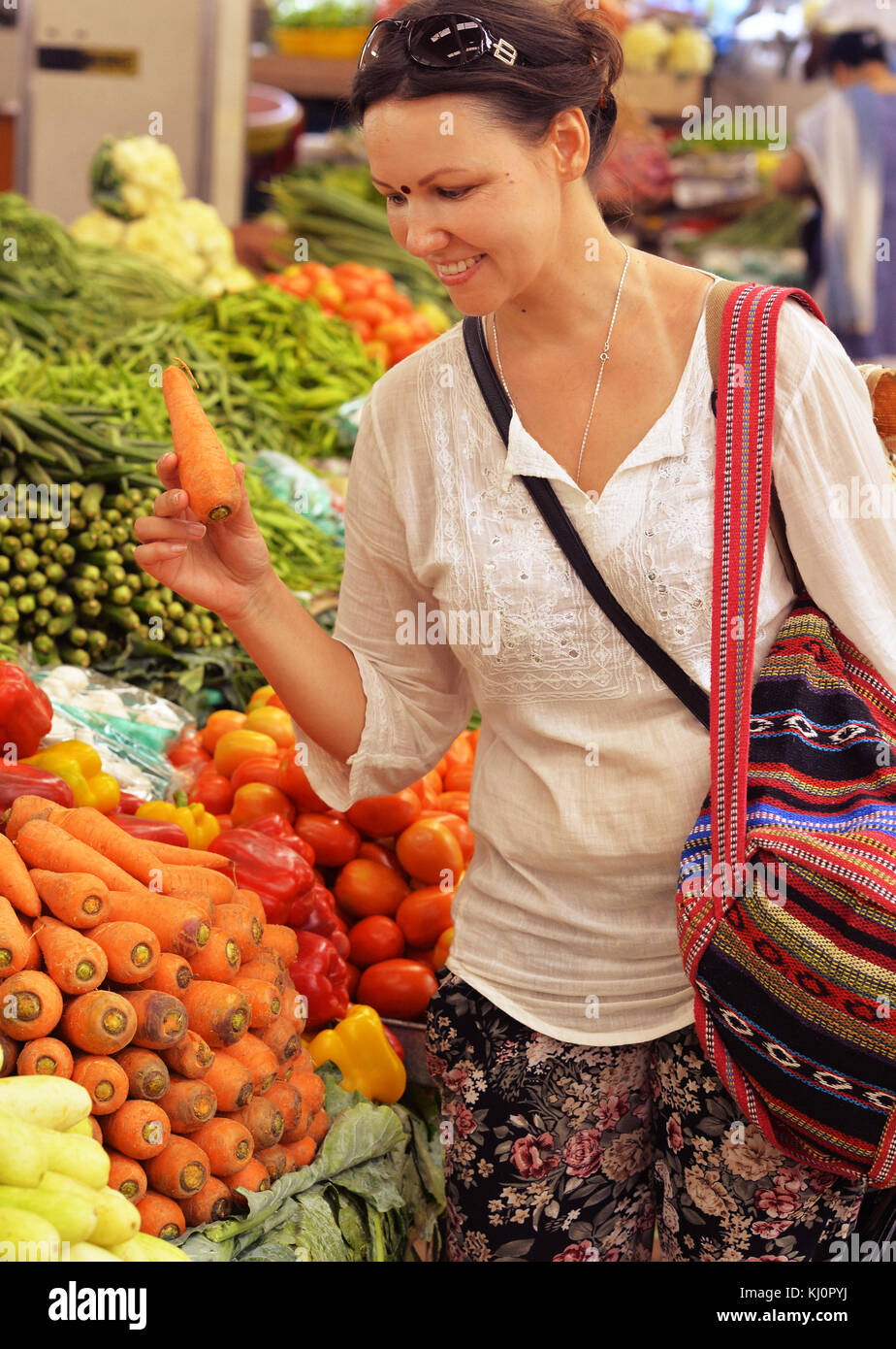 woman choosing vegetables on market Stock Photo - Alamy