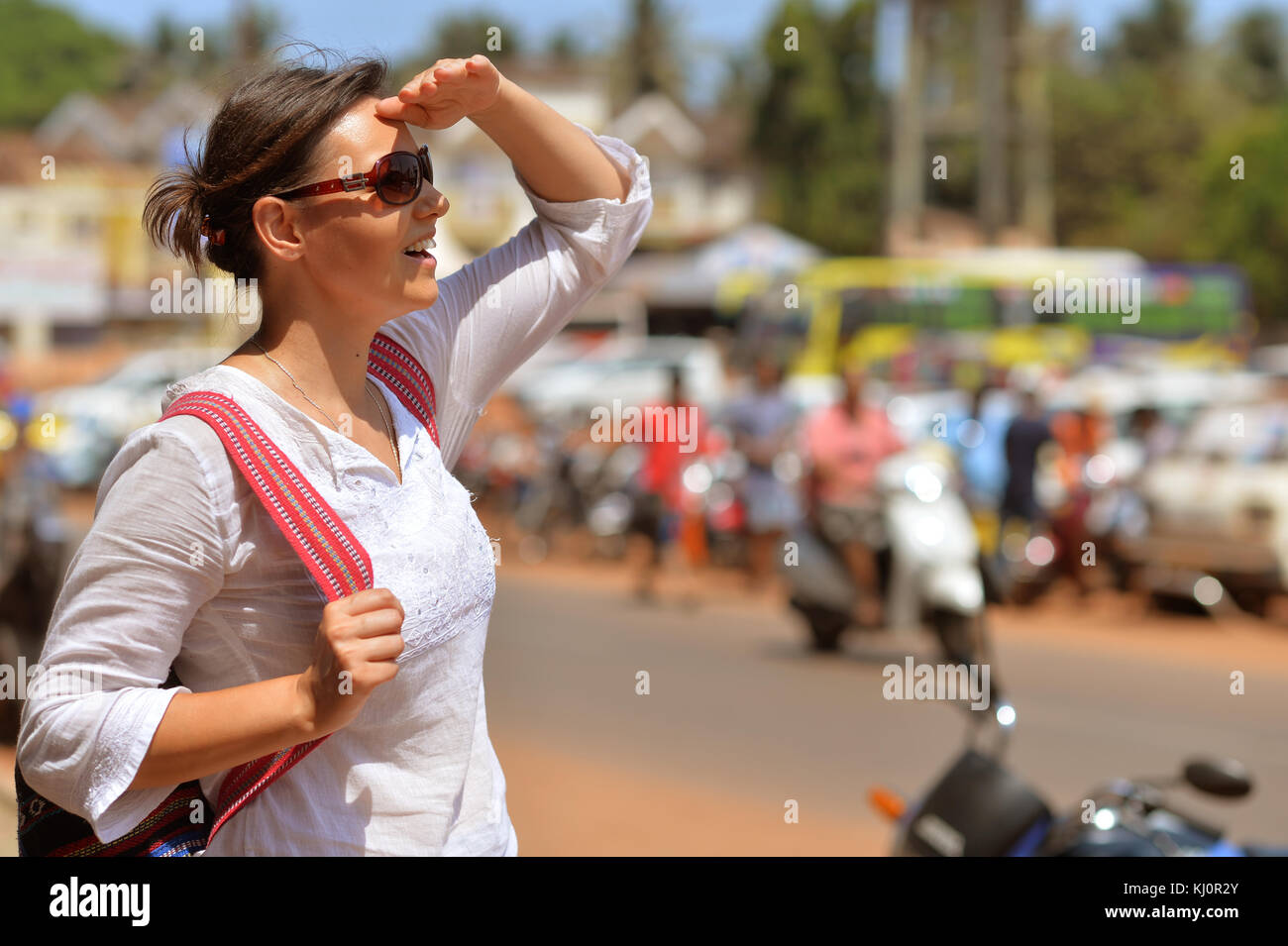 Attractive young woman standing Stock Photo - Alamy Attractive young woman standing Stock Photo - Alamy