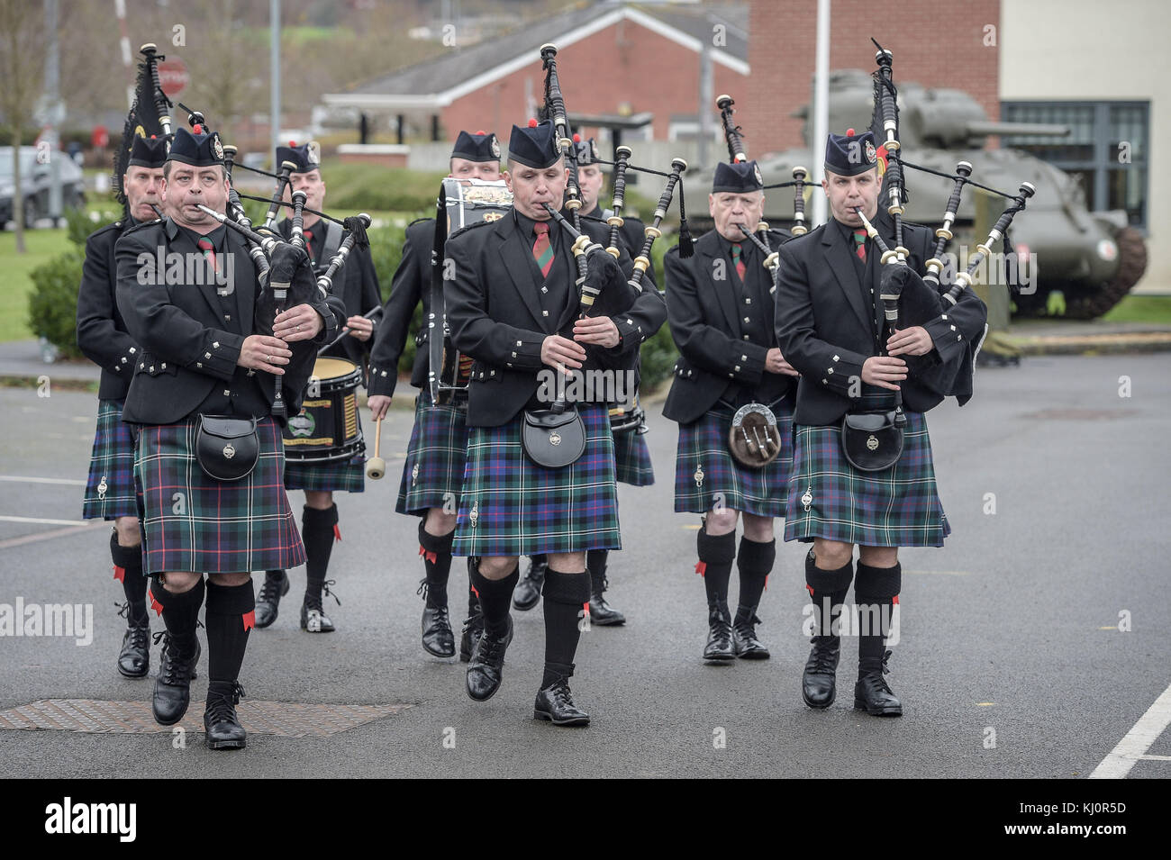 The Royal Tank Regiment pipe band march on during a parade to mark ...