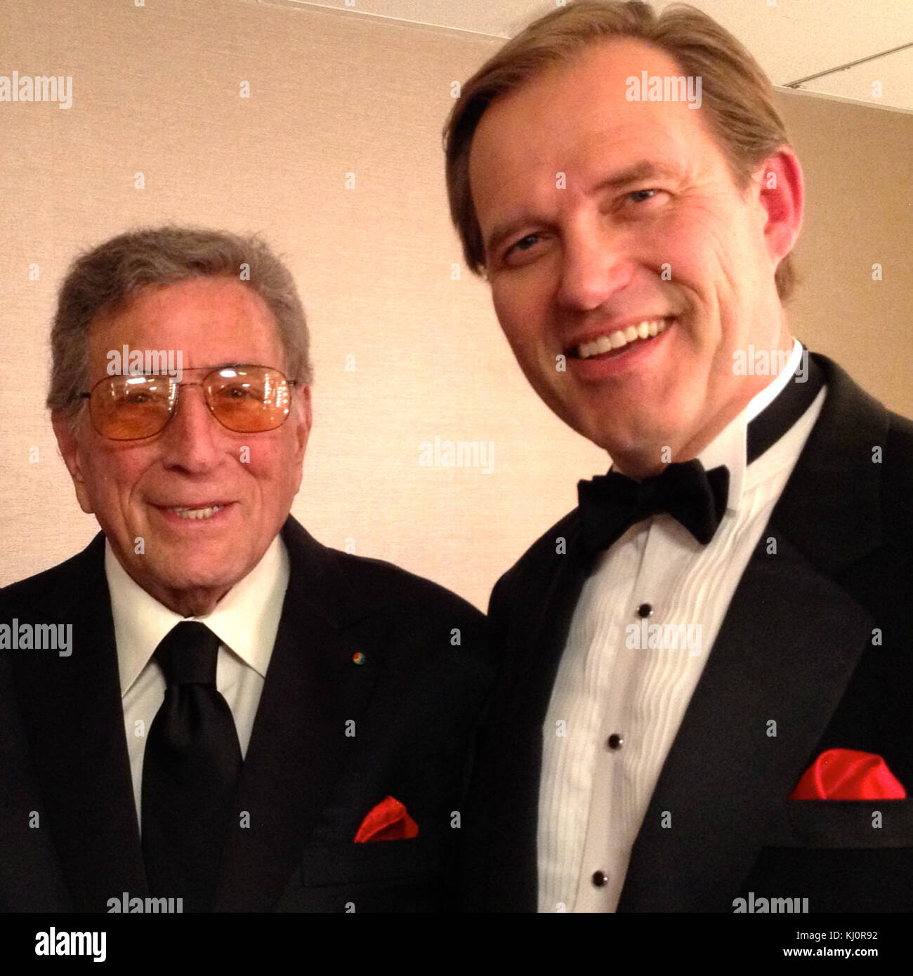 This image captures Tony Bennett, the iconic American singer, alongside ...