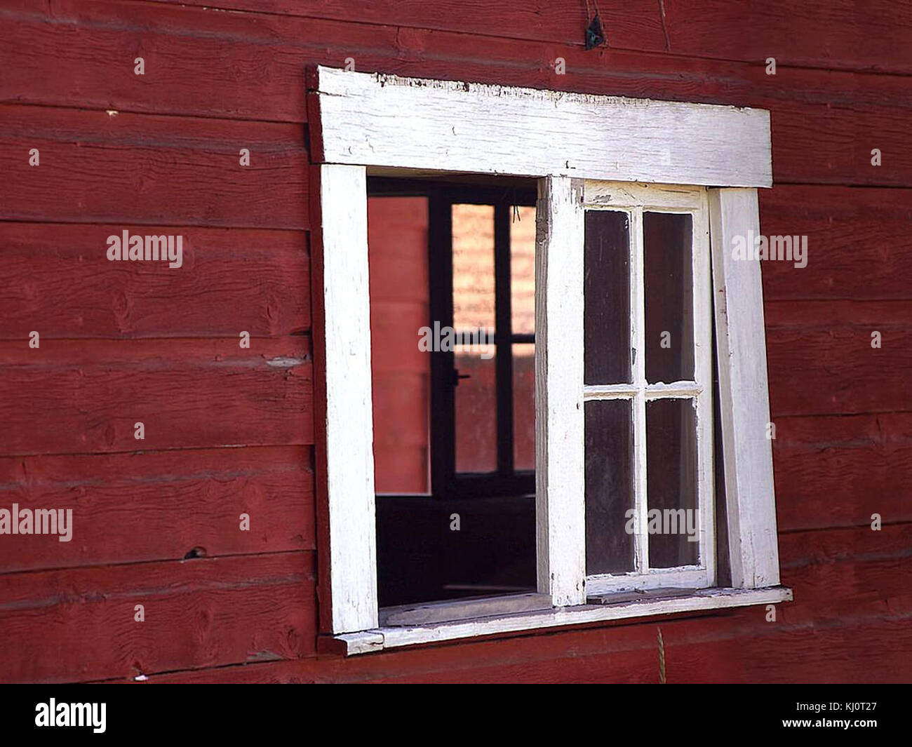Barns windows red Stock Photo - Alamy