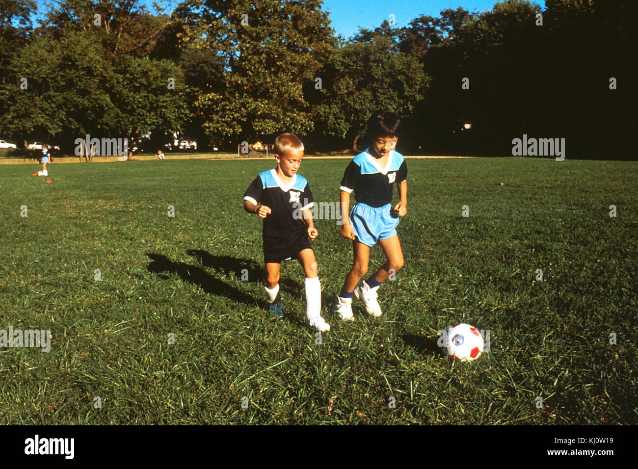 Children playing soccer Stock Photo - Alamy