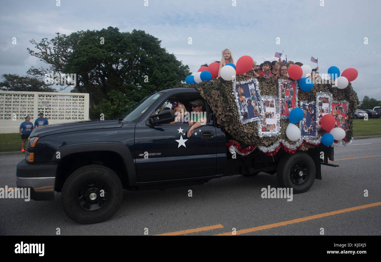 A float makes its way down the street during a Veterans Day parade Nov ...