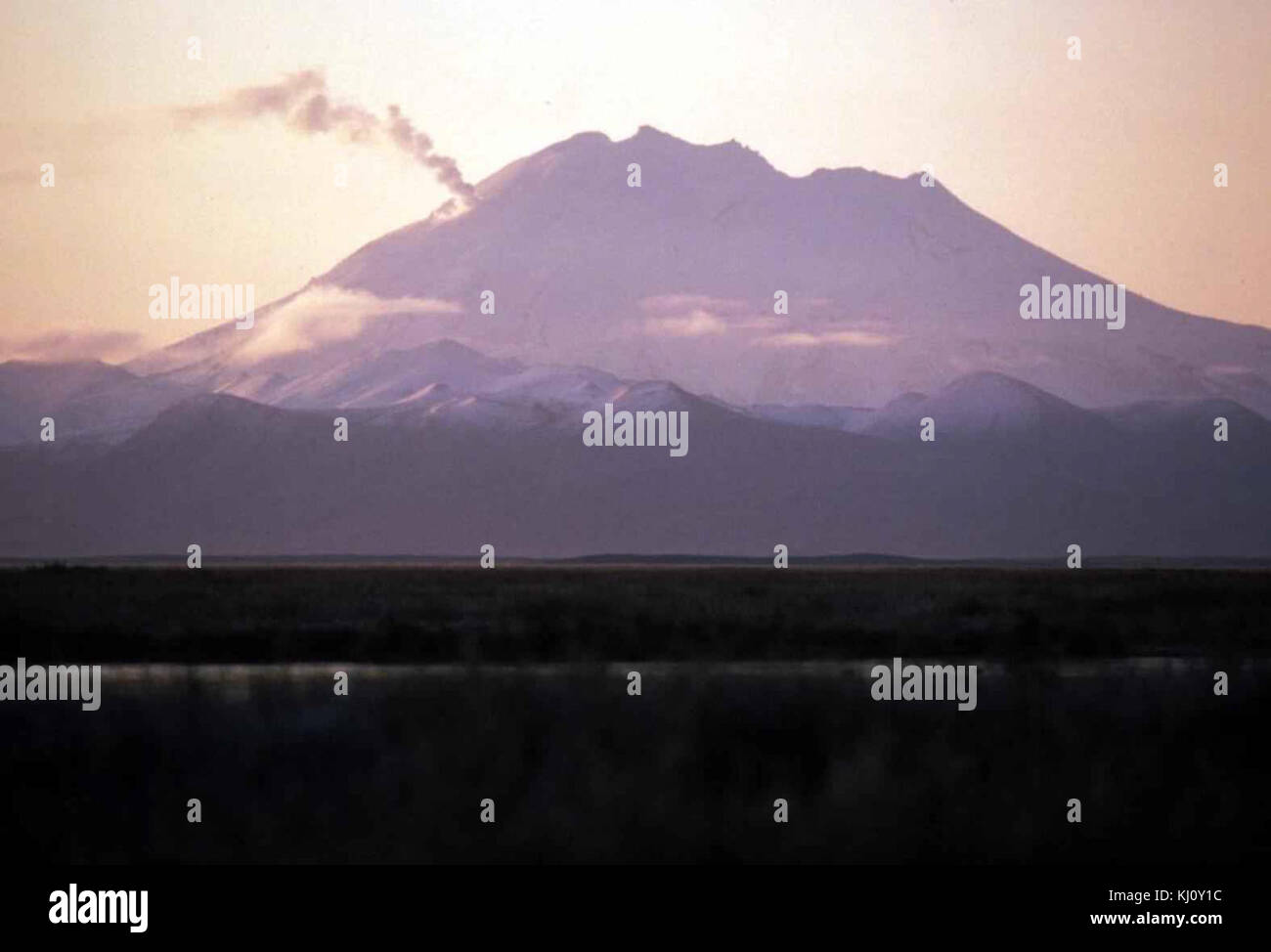 An Alaska Peninsula smoking volcano Stock Photo - Alamy