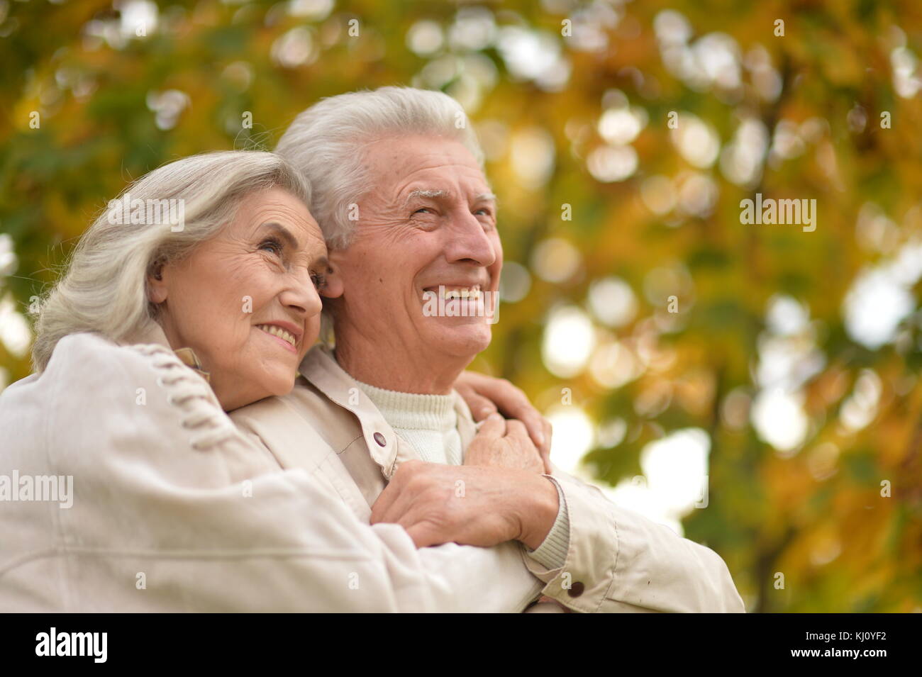 senior couple hugging Stock Photo - Alamy