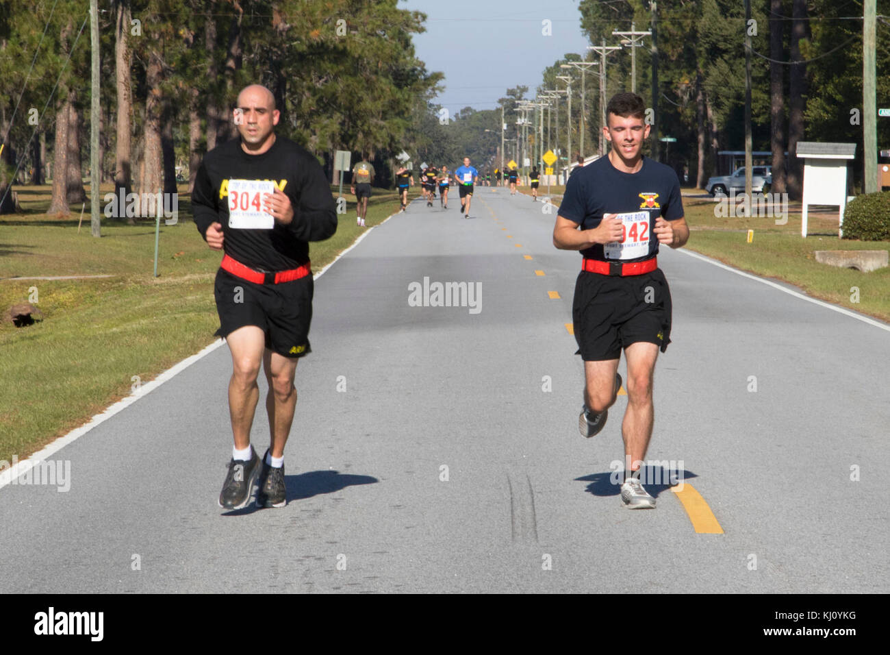 Soldiers from the 3rd Infantry Division compete in a 10K race during ...