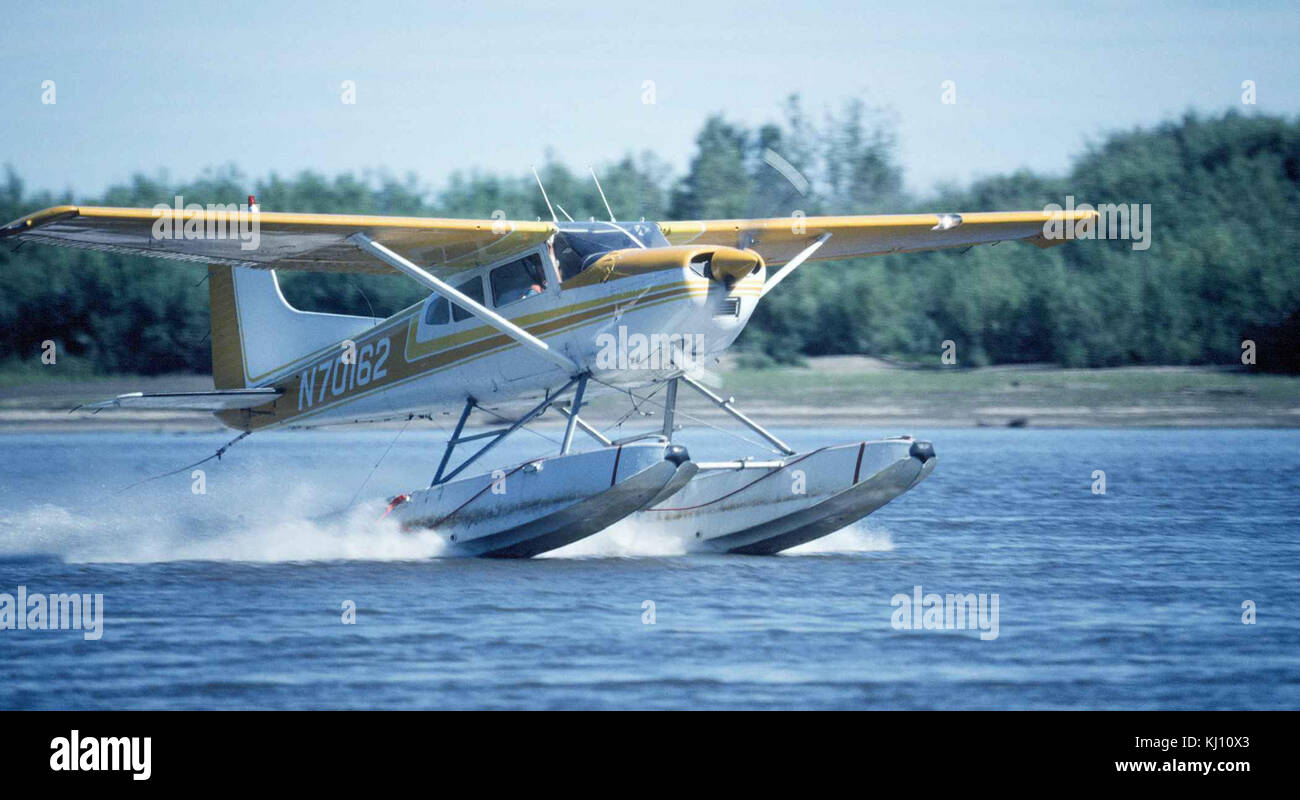 Light float plane aircraft making a landing Stock Photo - Alamy