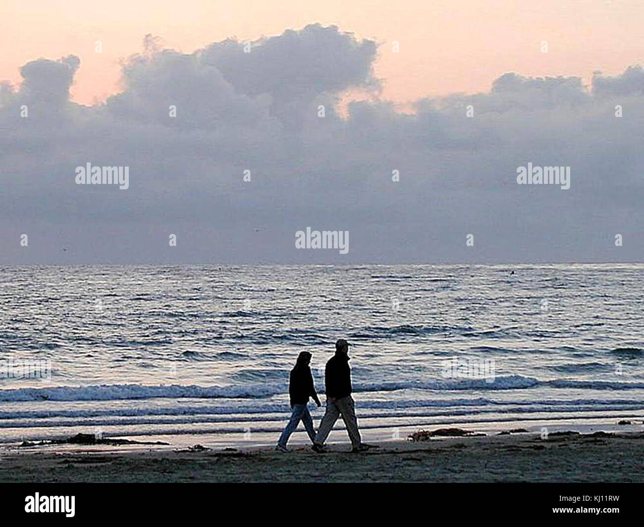 Ocean beaches walking Stock Photo - Alamy