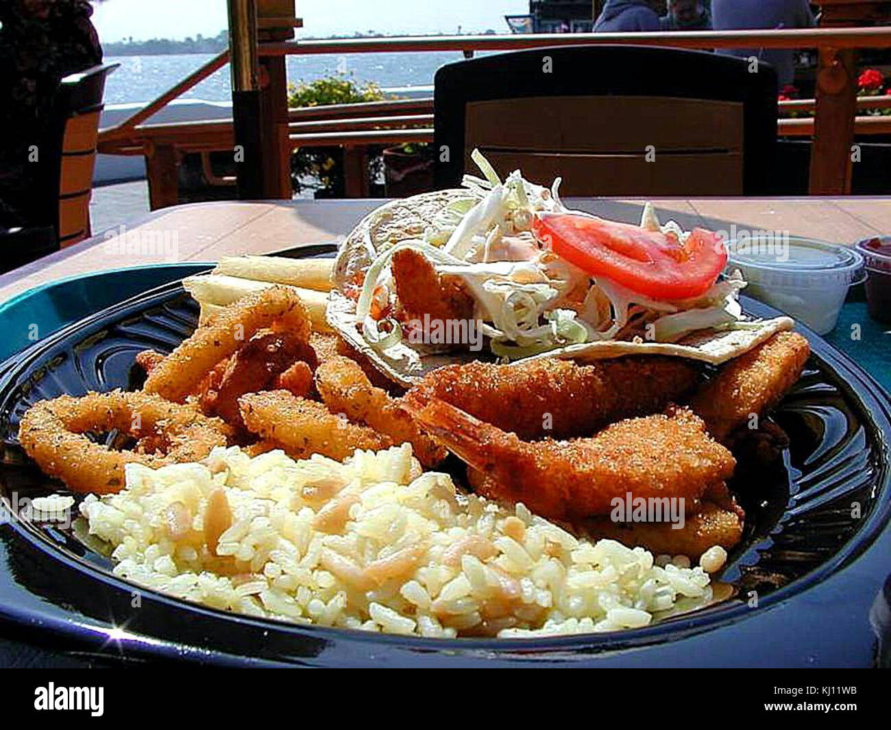 Ocean bays food fried clamari fish rice plate (1 Stock Photo - Alamy