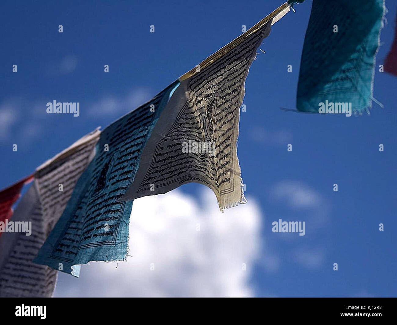Prayer flags blowing in the breeze Stock Photo - Alamy