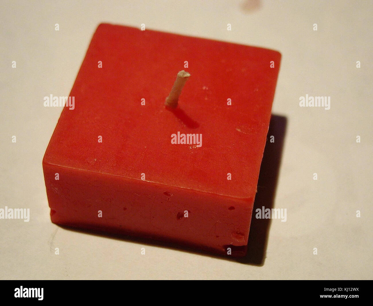 Red candle object Stock Photo - Alamy