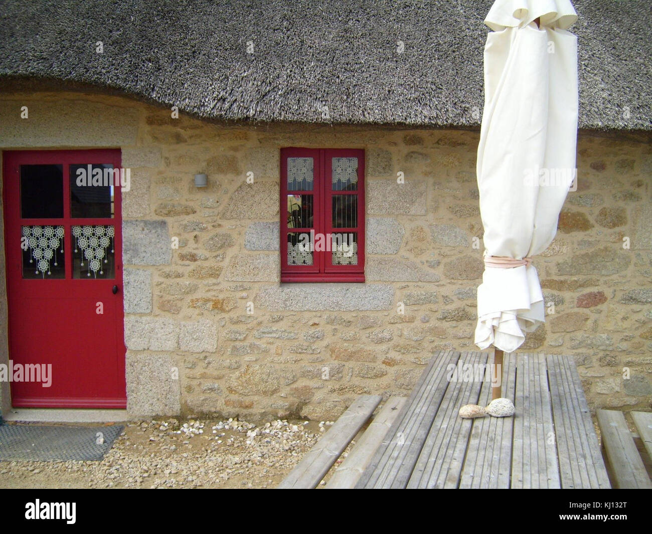 Red door and window Stock Photo - Alamy