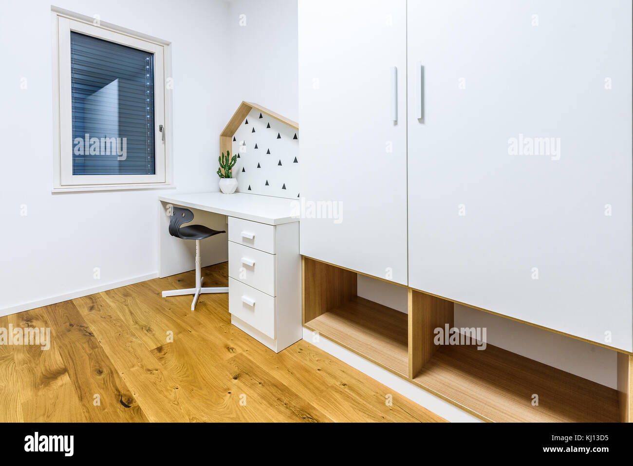 Modern children play room with bed and study desk. Cosy and fancy ...