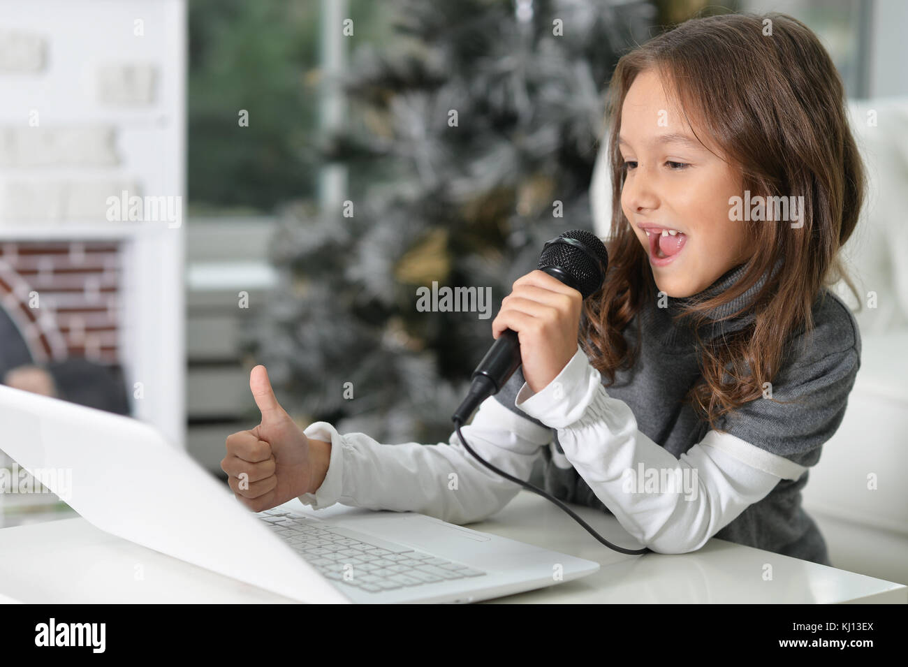 girl singing karaoke Stock Photo - Alamy