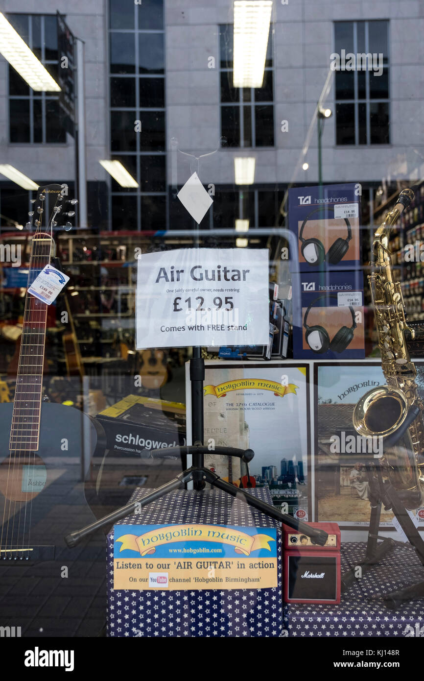 Free Air Guitar with stand, sign in music store window, Birmingham ...
