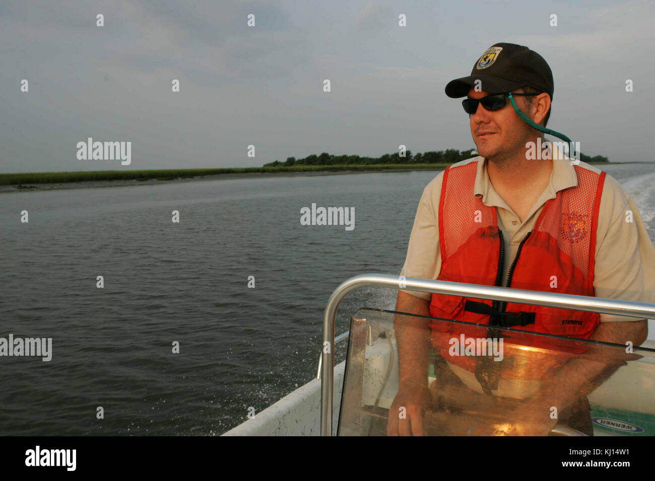 Man in fast boat Stock Photo - Alamy